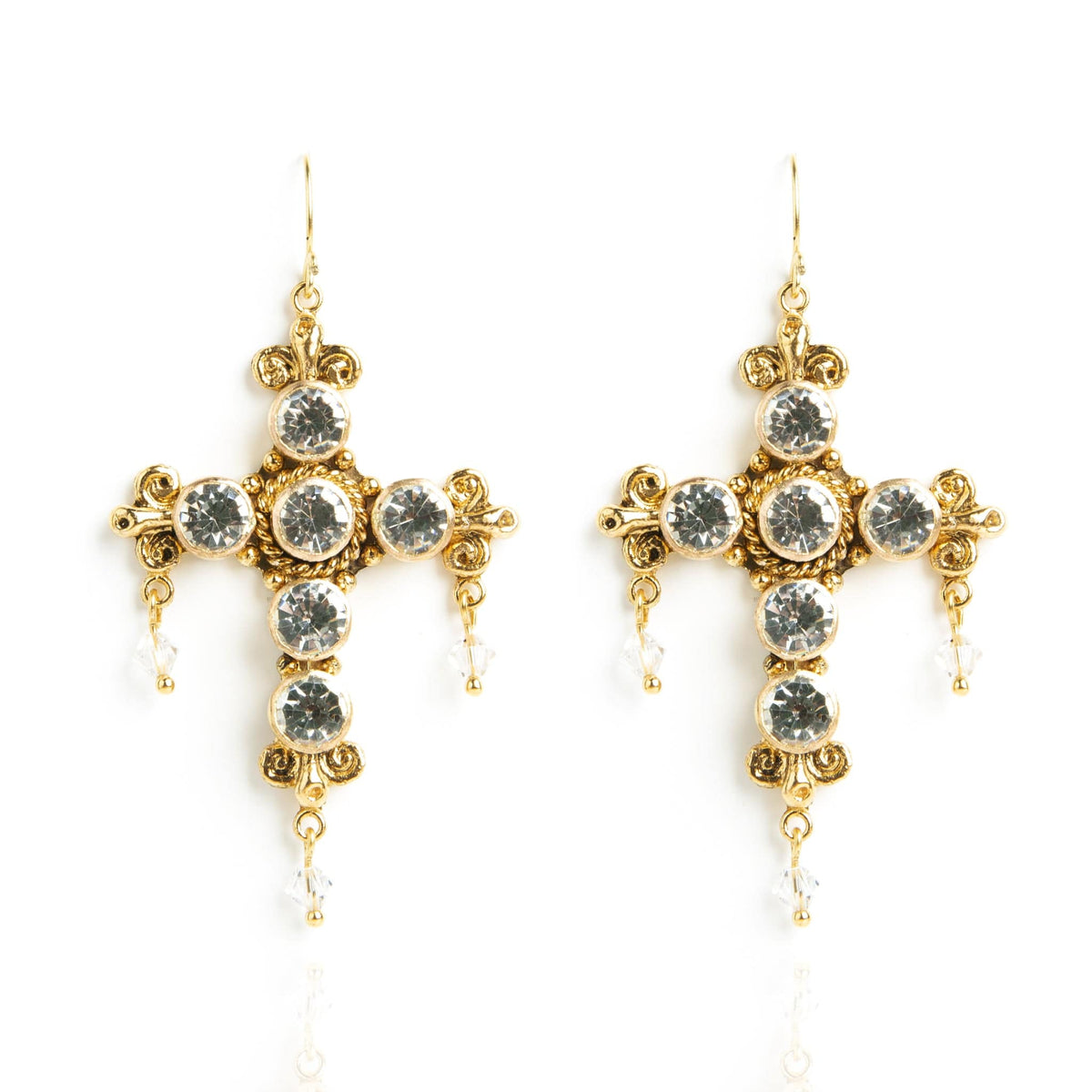 The Audrey Cross Earrings hangs from sterling silver hooks – Virgins ...